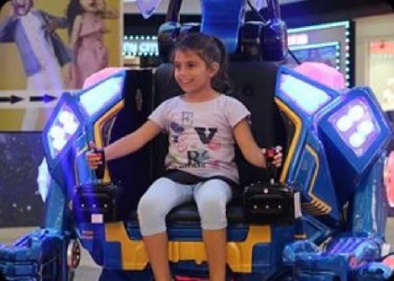Why is the Kiddie robot ride amusement buesiness so popular with kids